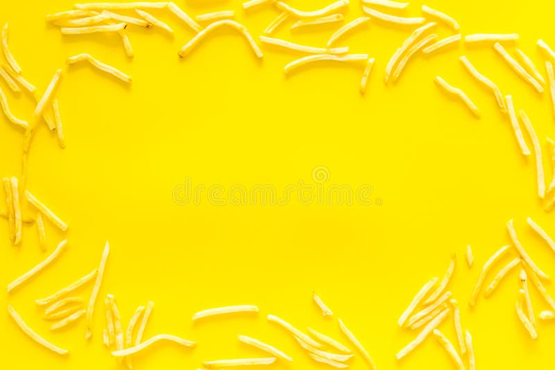 French Fries Frame on Yellow Table Top-down Copy Space Stock Image ...