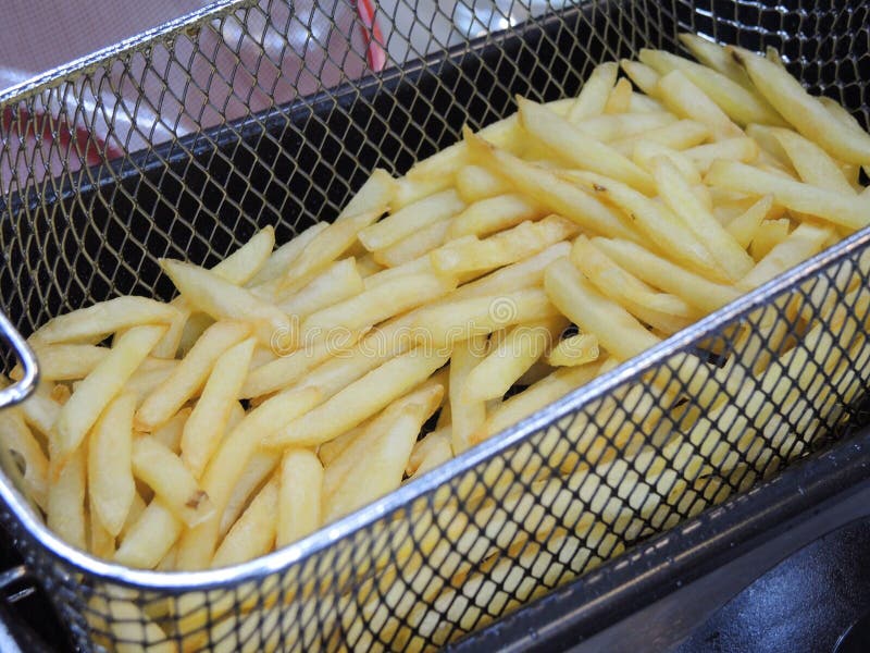 French Fries in Hot Fat in a Deep Fryer Stock Image - Image of potatoes ...
