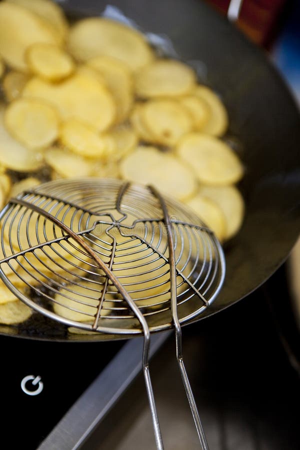 French fries in a pan stock photo. Image of appetizing - 60907004