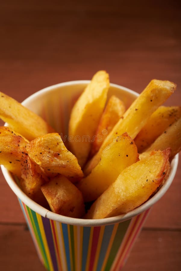 French fries in paper cup stock image. Image of energy - 81923869