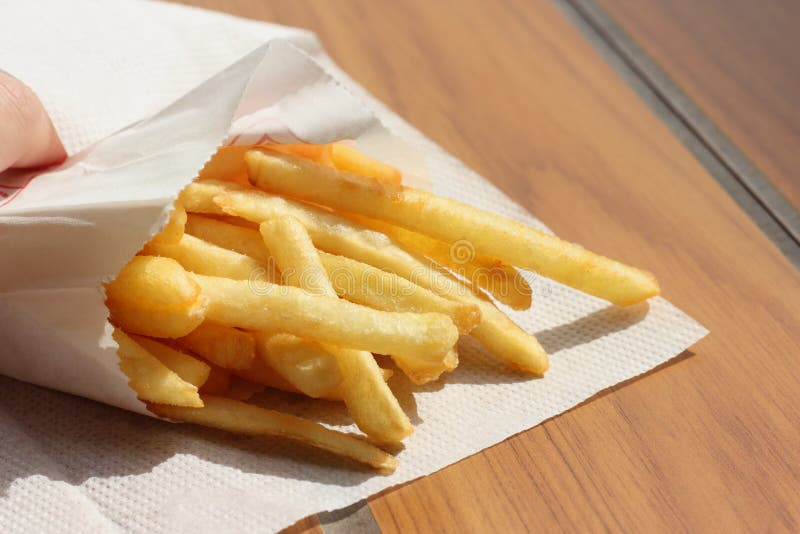 French Fries in Paper Packaging Stock Image - Image of packaging ...