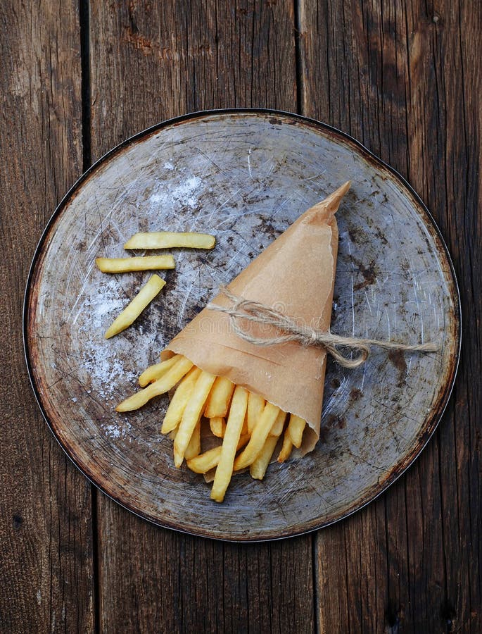French Fries in Paper Wrapper Stock Image - Image of rustic, fast: 65315853