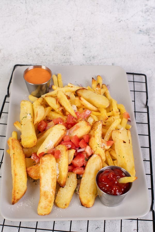 French fries on a plate stock photo. Image of flower - 294600872