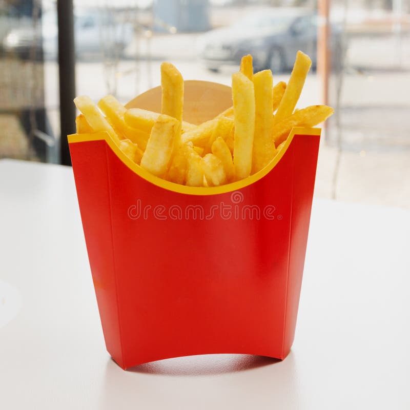 French Fries in a Red Box are on the Table in a Restaurant Stock Image ...