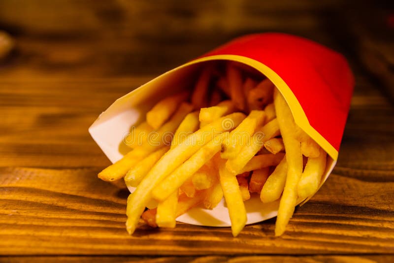 French Fries in Red Box on Wooden Table Stock Photo - Image of food ...