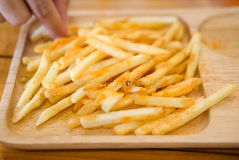 French Fries on Rustic Wood Stock Photo - Image of heap, wood: 97609834