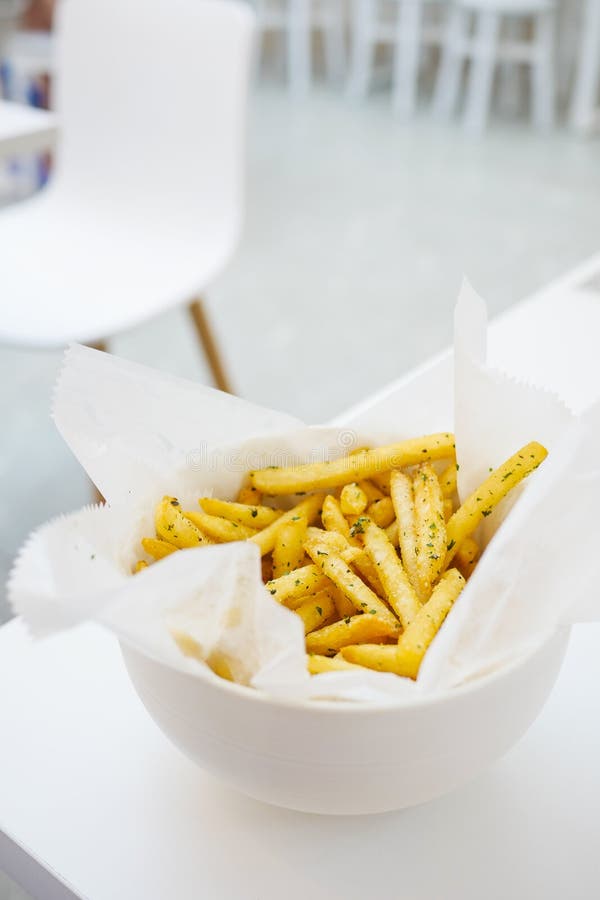 French Fries in a White Bowl on White Table Stock Image - Image of ...