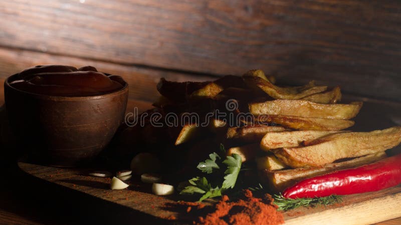 French Fries on Wooden Table Selective Focus, Low Key Stock Photo ...