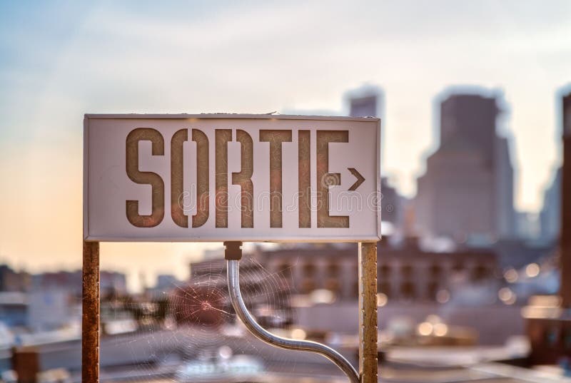 French Informational "exit" Sign with a Cobweb in Montreal Stock Photo ...
