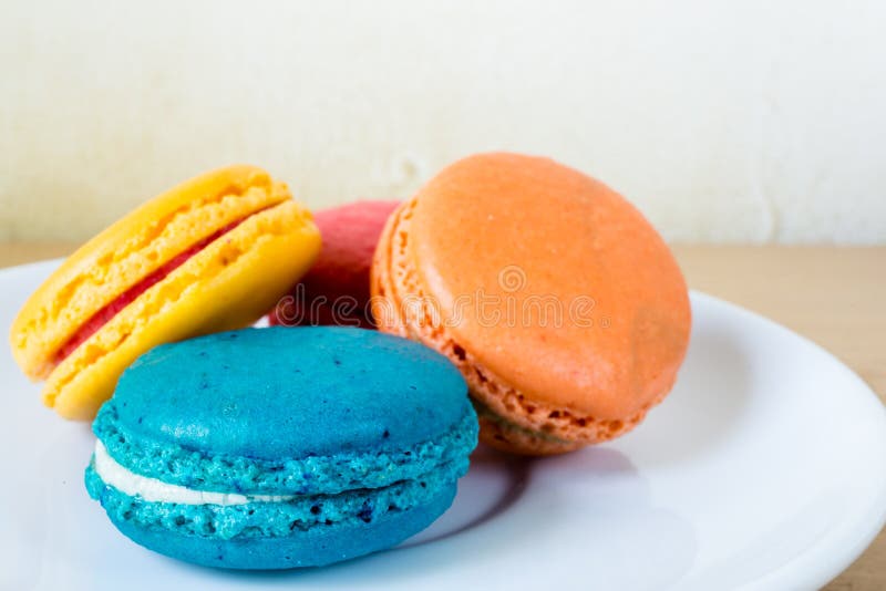 French macaroons on plate stock photo. Image of flavor - 50300020