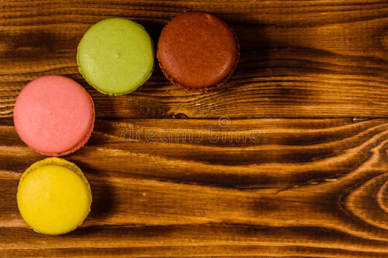 French Macaroons on Wooden Table. Top View Stock Image - Image of love ...