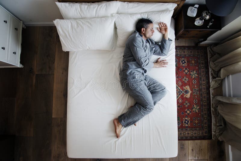 French Man Sleep Alone on Bed Stock Image - Image of alarm, latin ...
