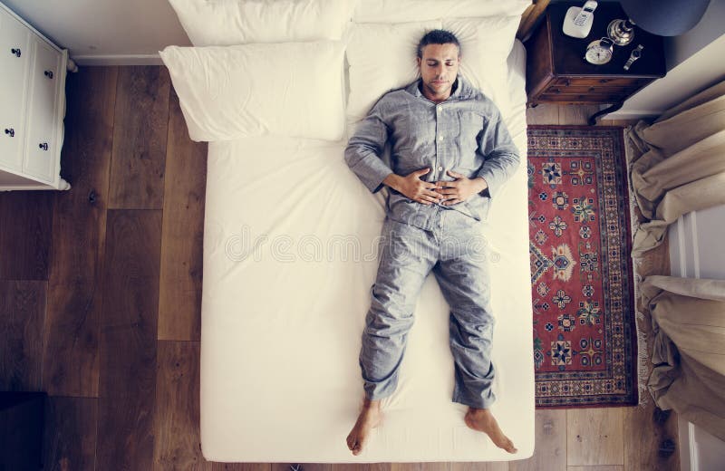 French Man Sleep Alone on Bed Stock Photo - Image of apartment, adult ...