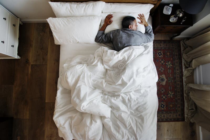 French Man Sleeping Alone on Bed Stock Photo - Image of america ...