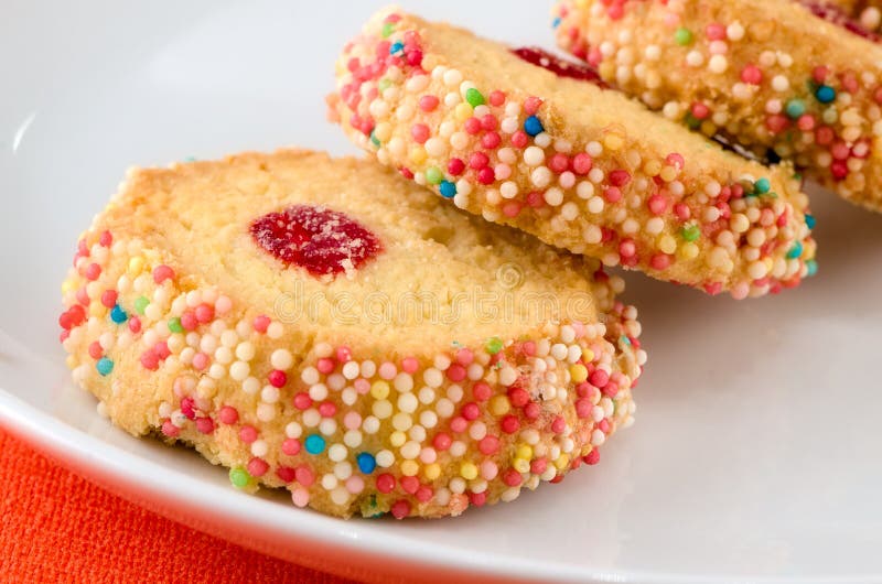 French Multi-colored Cookies Makoorons on a Yellow Background Stock ...