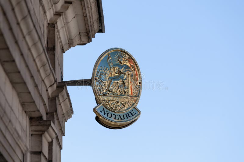 French notary brass sign editorial photography. Image of french - 358148272
