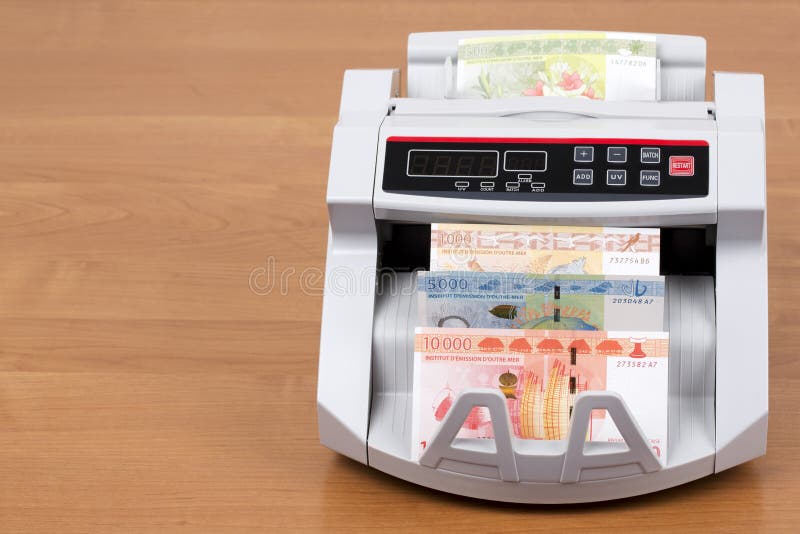 French Pacific Territories Money in a Counting Machine Stock Image ...