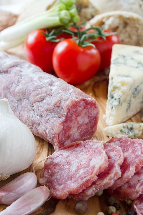 French Saucisson with Cheese on Cutting Board Stock Photo - Image of ...