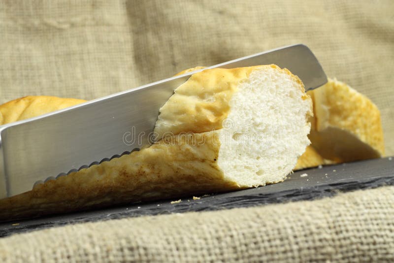 French stick bread cutting stock image. Image of french - 66275161