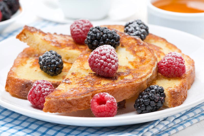 French Toast with Fresh Berries and Powdered Sugar, Close-up Stock ...