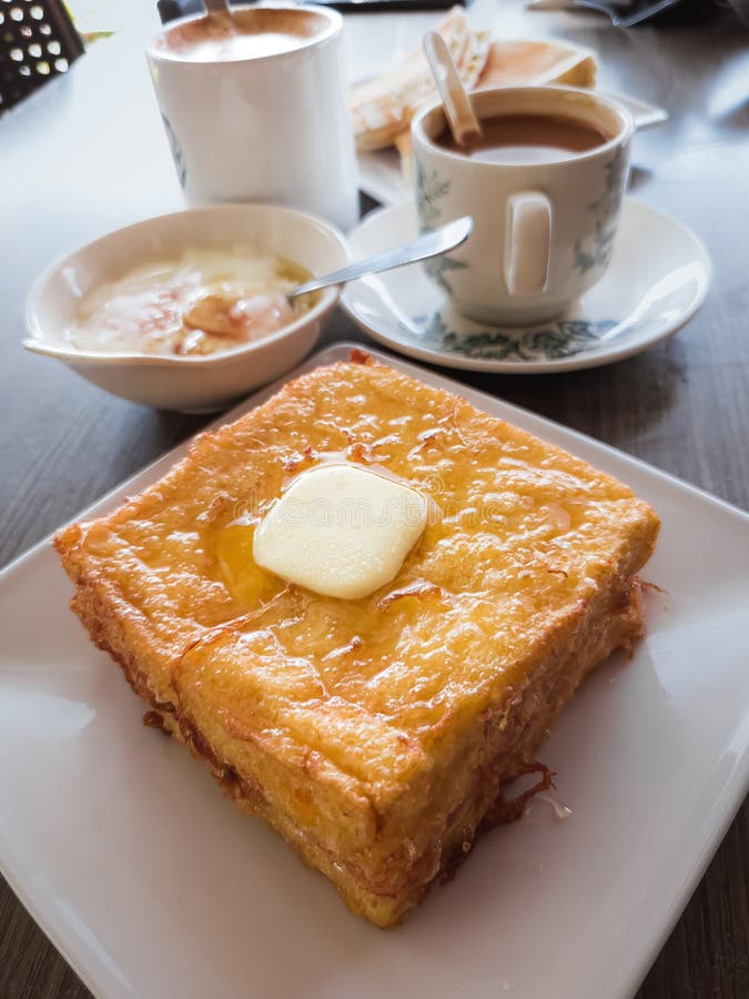 French Toast with Honey Syrup and Butter Served during Breakfast Stock ...