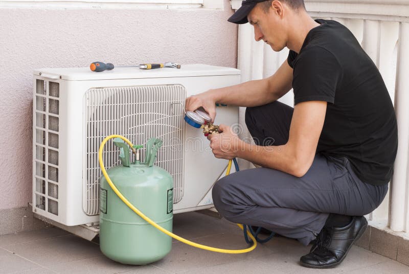 Air Conditioner Repair Man stock image. Image of professional - 27415733