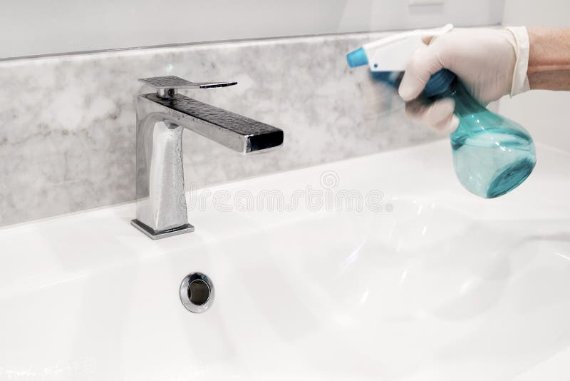 Sanitizing a Bathroom Sink and Faucet Stock Photo - Image of protection ...