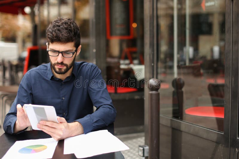 Fresh Account Manager Working with Papers and Tablet at Cafe Tab Stock ...
