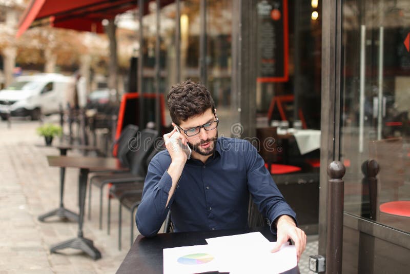 Fresh Account Manager Working with Papers and Tablet at Cafe Tab Stock ...