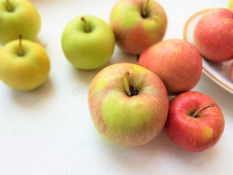 Fresh Apples of Different Colors on the Table Stock Image - Image of ...