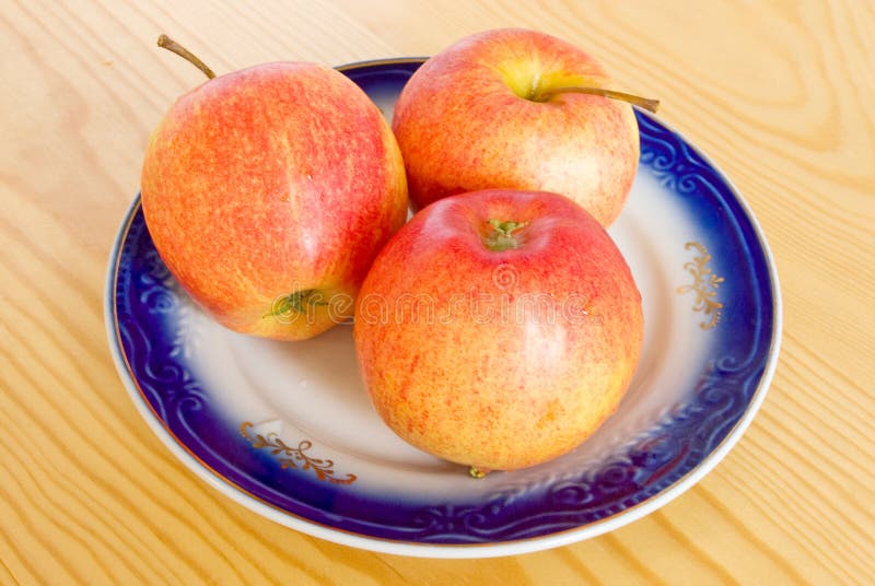 Fresh apples on the plate stock photo. Image of fruit - 11117308