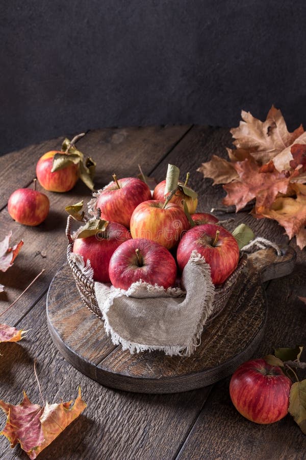 Fresh apples on a table stock photo. Image of basket - 185692208