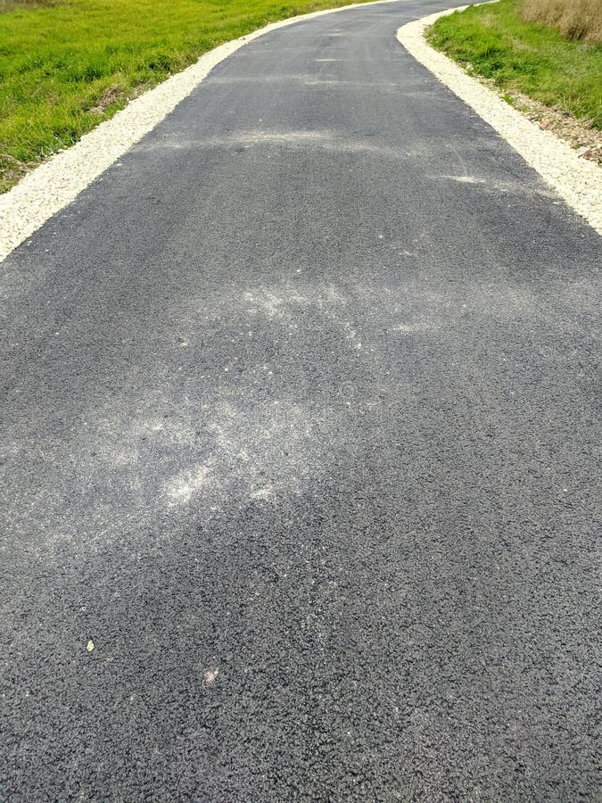 Fresh Asphalt in the Field in the Evening Stock Photo - Image of ...