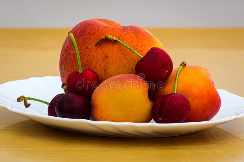 Fresh Assorted Fruit in a White Dish Stock Image - Image of cuisine ...