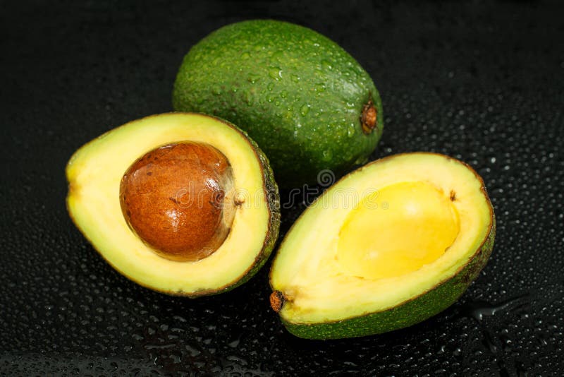 Avocado Drops in the Water Scattering a Lot of Sprays and Drops Stock ...
