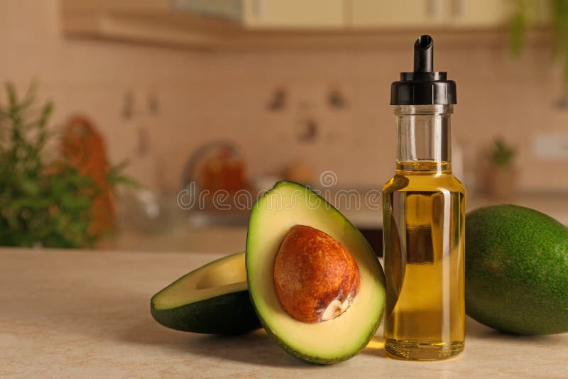 Fresh Avocados Cooking Oil Beige Marble Table Kitchen Stock Photos ...