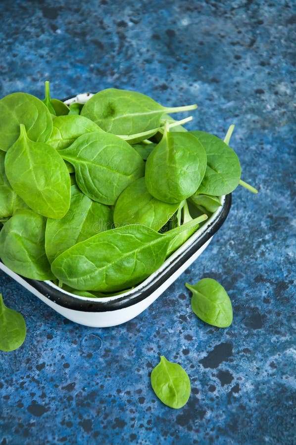 Fresh baby spinach leaves stock photo. Image of cooking - 89191792