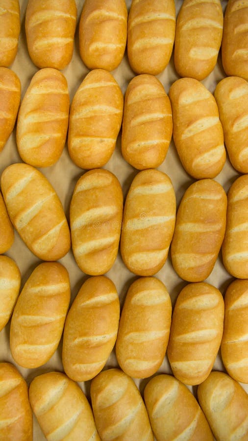 Fresh Baked Bread in Tray Rack in Stack Stock Photo - Image of display ...
