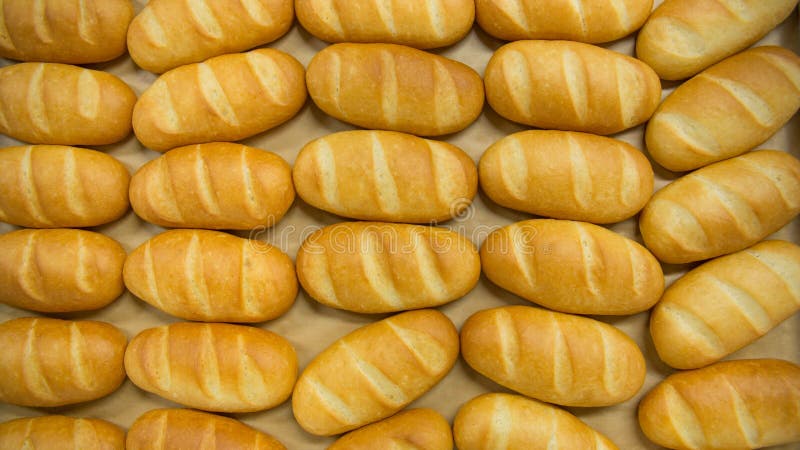 Fresh Baked Bread in Tray Rack in Stack. Top View Stock Photo - Image ...