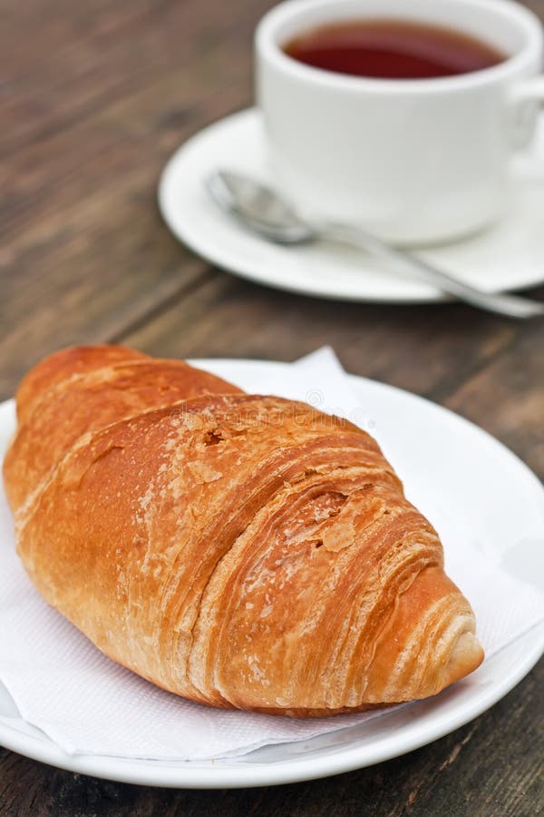 Fresh-baked Croissant and Cup of Tea Stock Photo - Image of breakfast ...