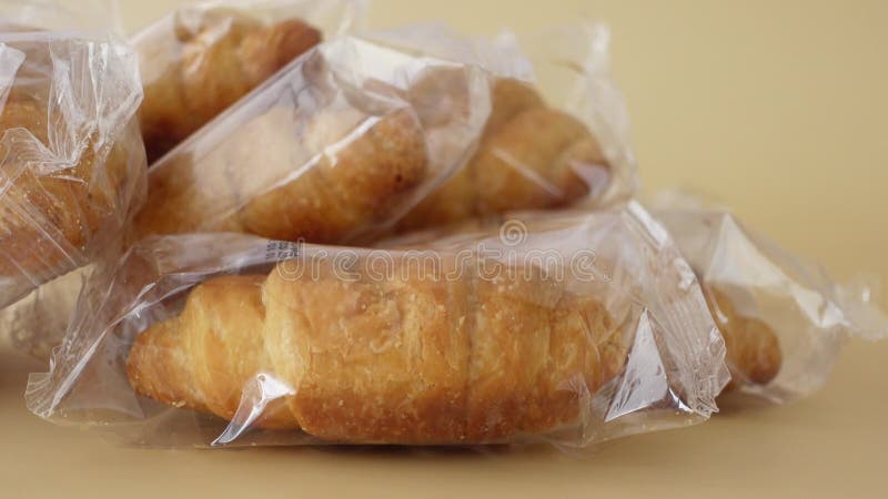 Fresh Baked Croissant in a Plastic Packet Stock Video - Video of crispy ...