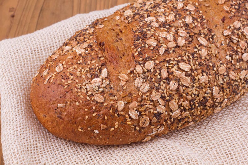 Fresh baked loaf of bread stock image. Image of table - 31050031