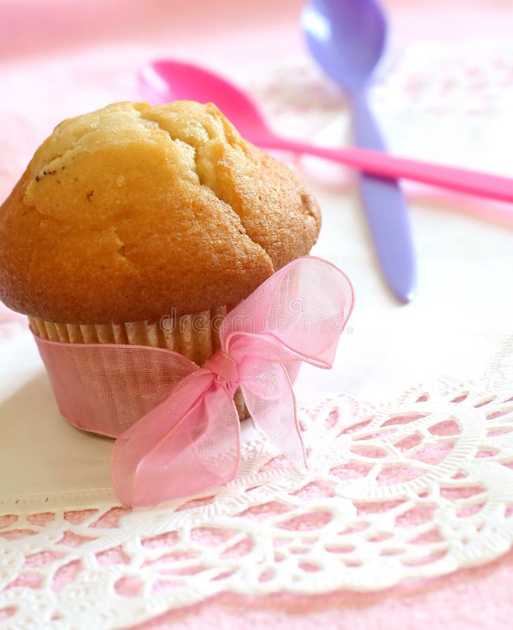 Fresh Baked Muffin with Pink Bow Stock Photo - Image of spoon, ribbon ...