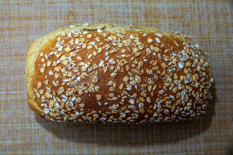 Fresh Baked Oatmeal Loaf Lies Stock Photo - Image of healthy, crust ...
