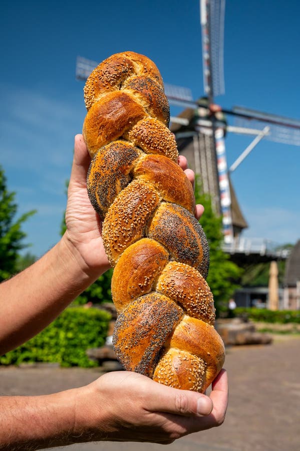 Fresh Baked Plaited Bread and Grain Wind Mill on Background, North ...