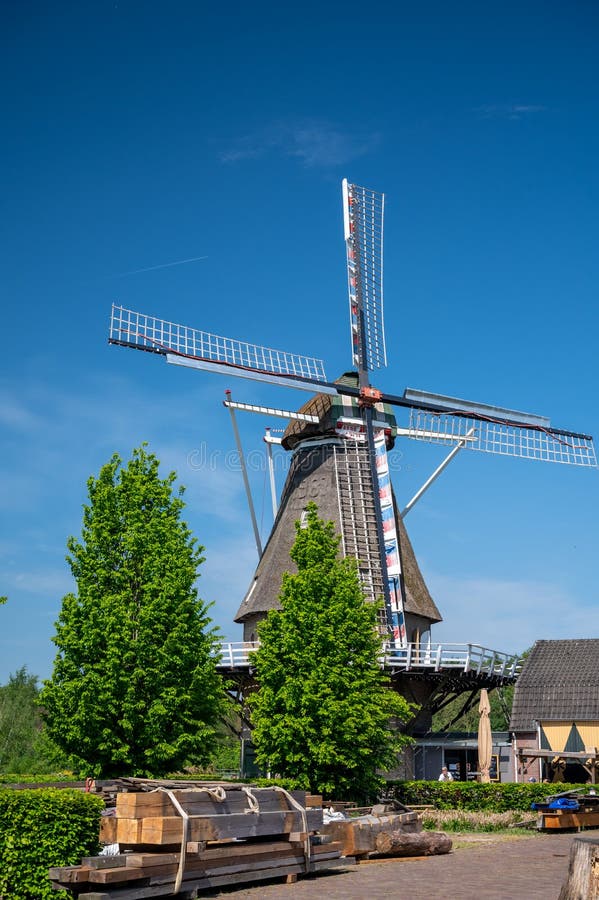 Fresh Baked Plaited Bread and Grain Wind Mill on Background, North ...
