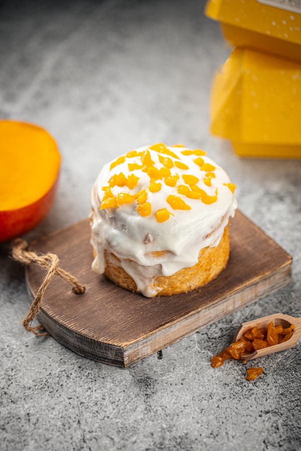Fresh Baked Sweet Bun Roll with Cream on Serving Board Stock Photo ...