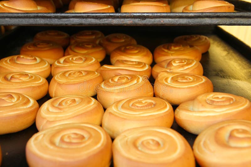 Fresh Bakery Products on a Industrial Baking Tray Stock Photo - Image ...