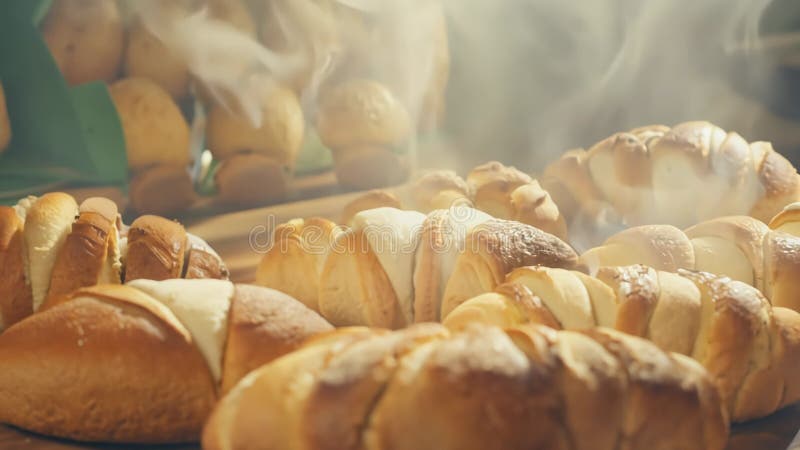 Fresh Bakery on the Table. Handmade Bread with Steam, Just Out of Oven ...