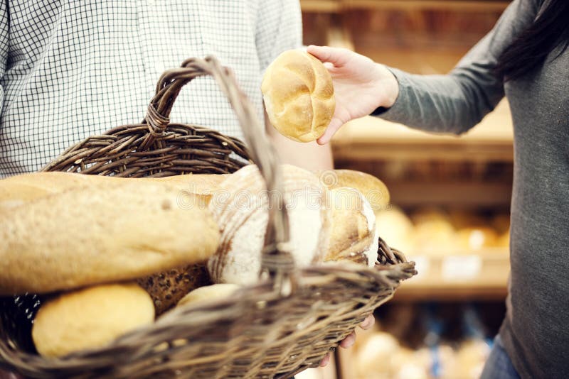 Fresh bakes bread stock image. Image of groceries, holding - 29211925